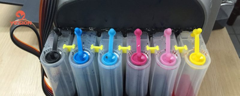 Why is my ink not drying on glossy paper?